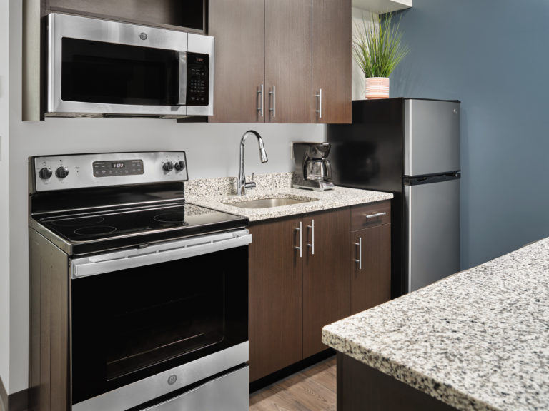 Suites & Amenities | stayAPT Suites | Full Kitchens, Laundry, & WiFi